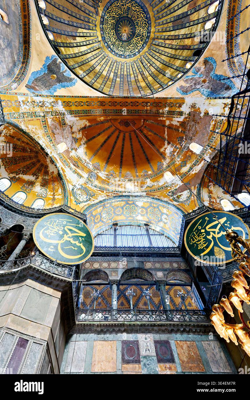 Visitors explore the interior of Hagia Sophia Grand Mosque in Istanbul ...