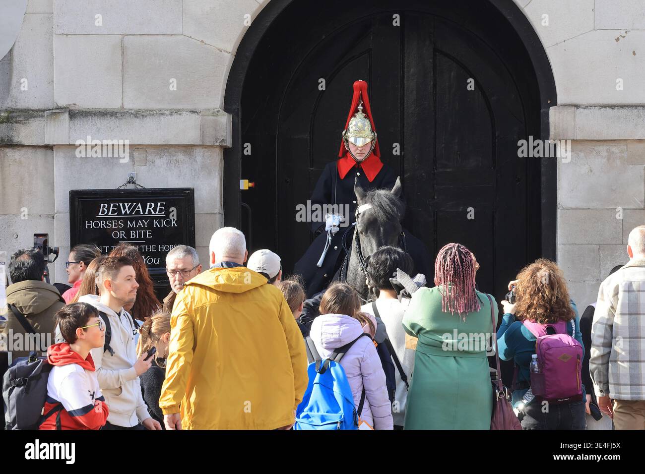 Crowd of tourists by Horseguards Parade on Whitehall, in central London ...