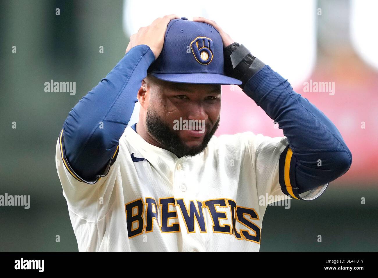 Milwaukee Brewers center fielder Jackson Chourio adjusts his hat before ...