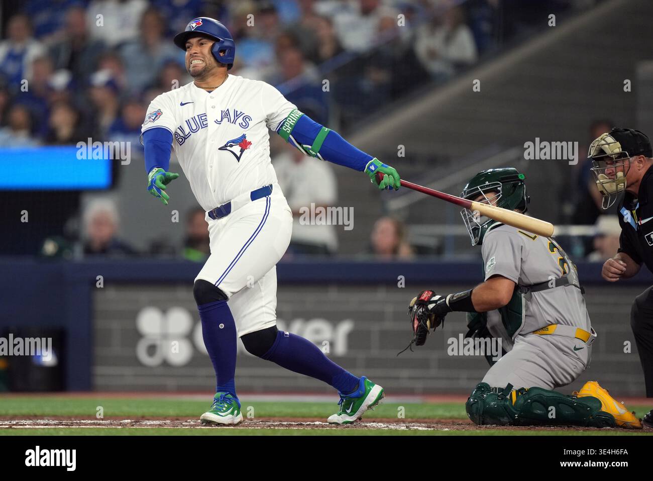 Toronto Blue Jays designated hitter George Springer (4) takes a foul ...