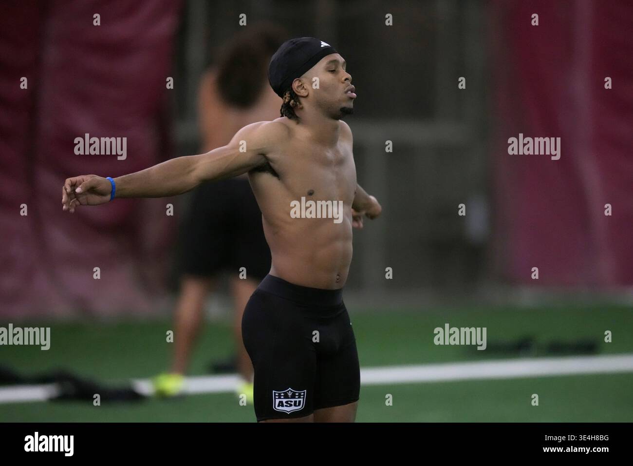 Arizona State defensive back Keith Abney II warms up prior to his 40 ...