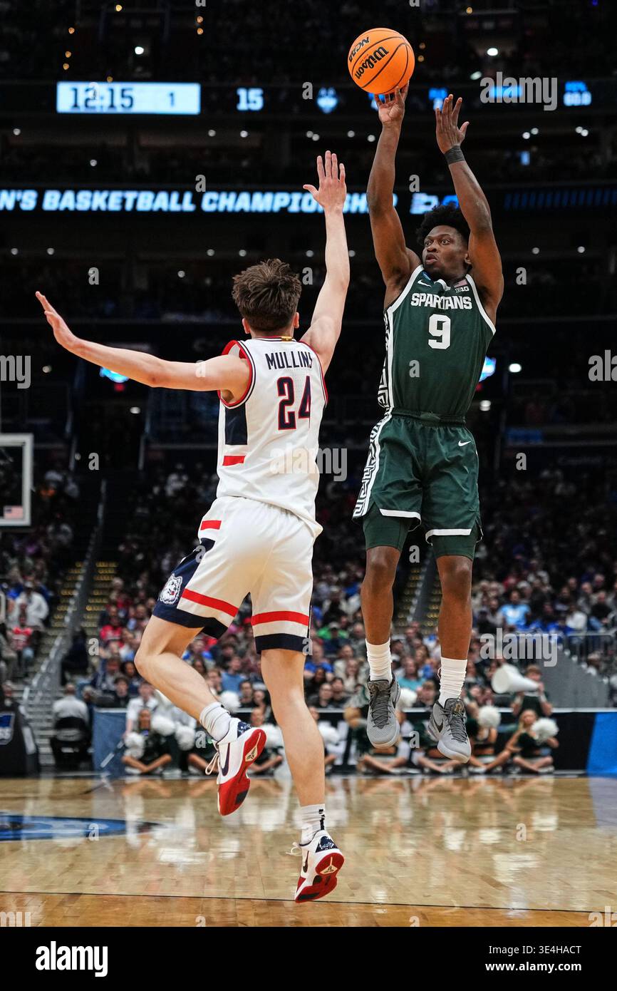 Michigan State guard Trey Fort (9) shoots over UConn guard Braylon ...