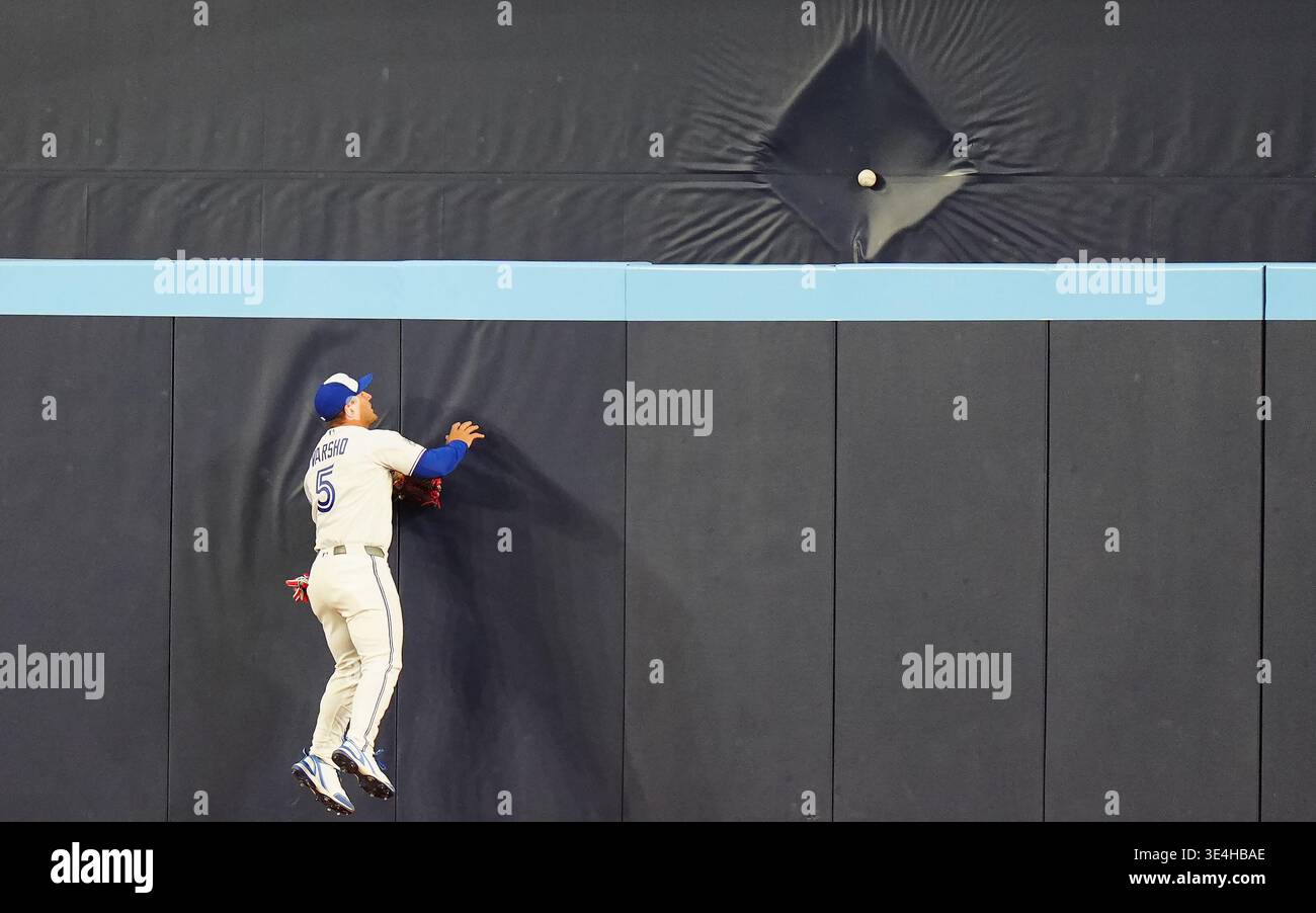 Toronto Blue Jays outfielder Daulton Varsho (5) watches the home run ...