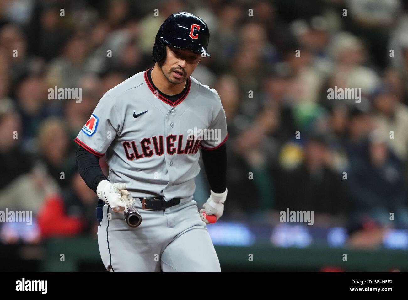 Cleveland Guardians' Steven Kwan reacts to hitting into a double play ...