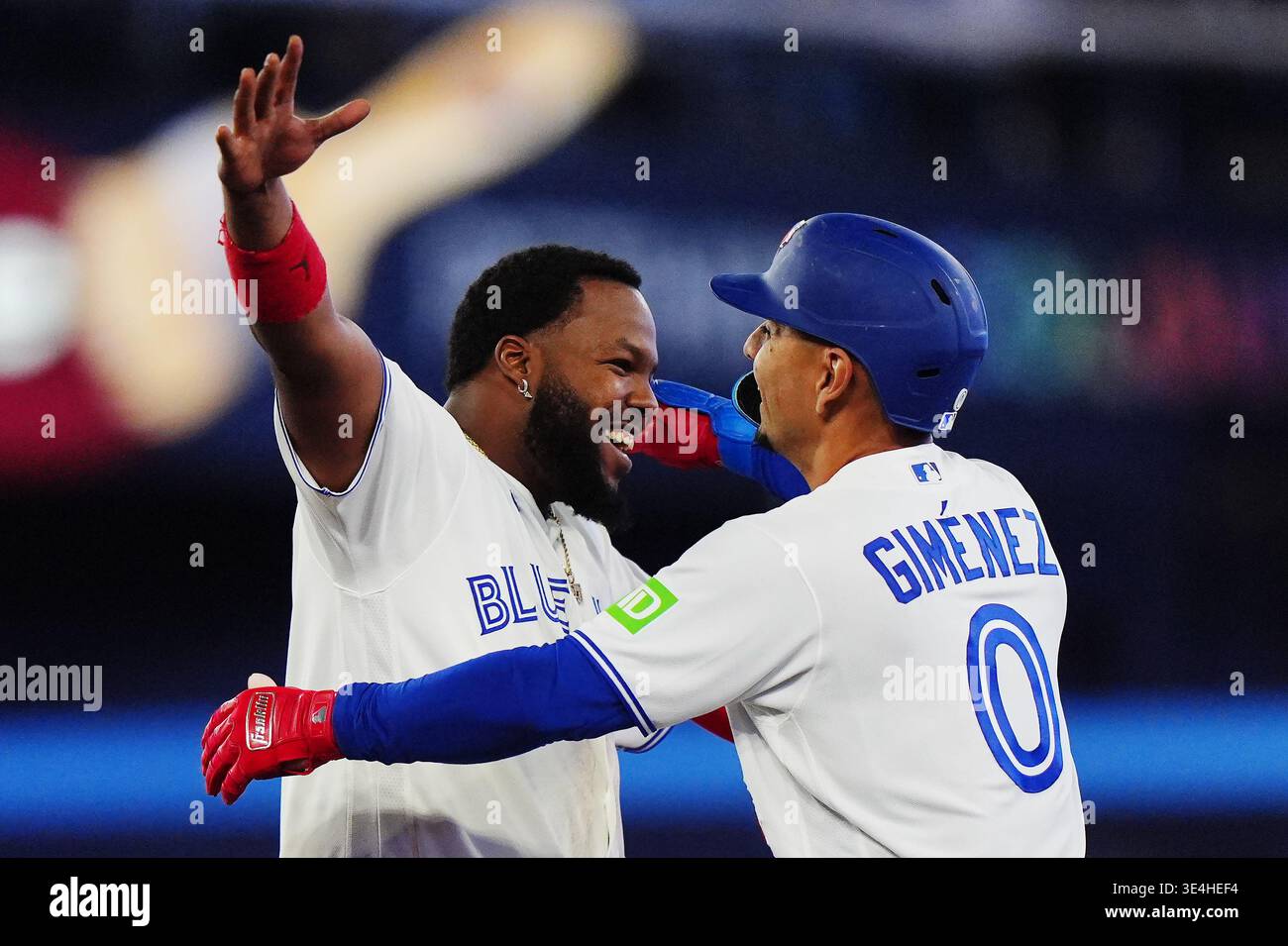 Toronto Blue Jays' Andres Gimenez (0) celebrates his walk-off single ...