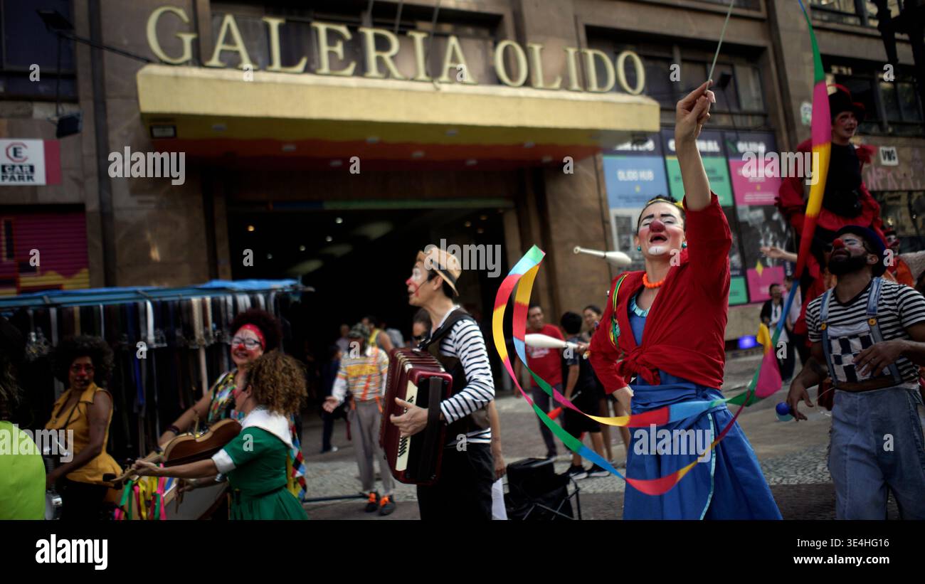 The artists participate in a parade as part of the celebration of ...