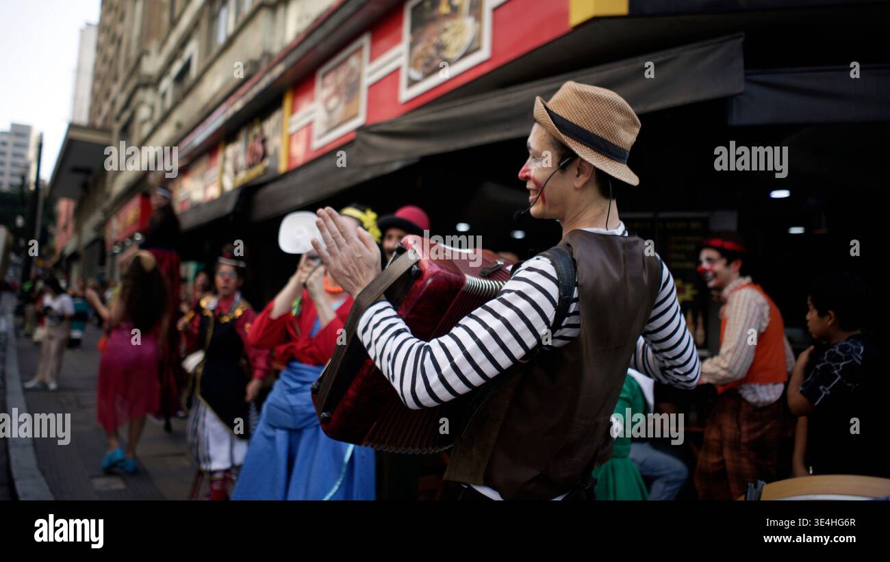The artists participate in a parade as part of the celebration of ...