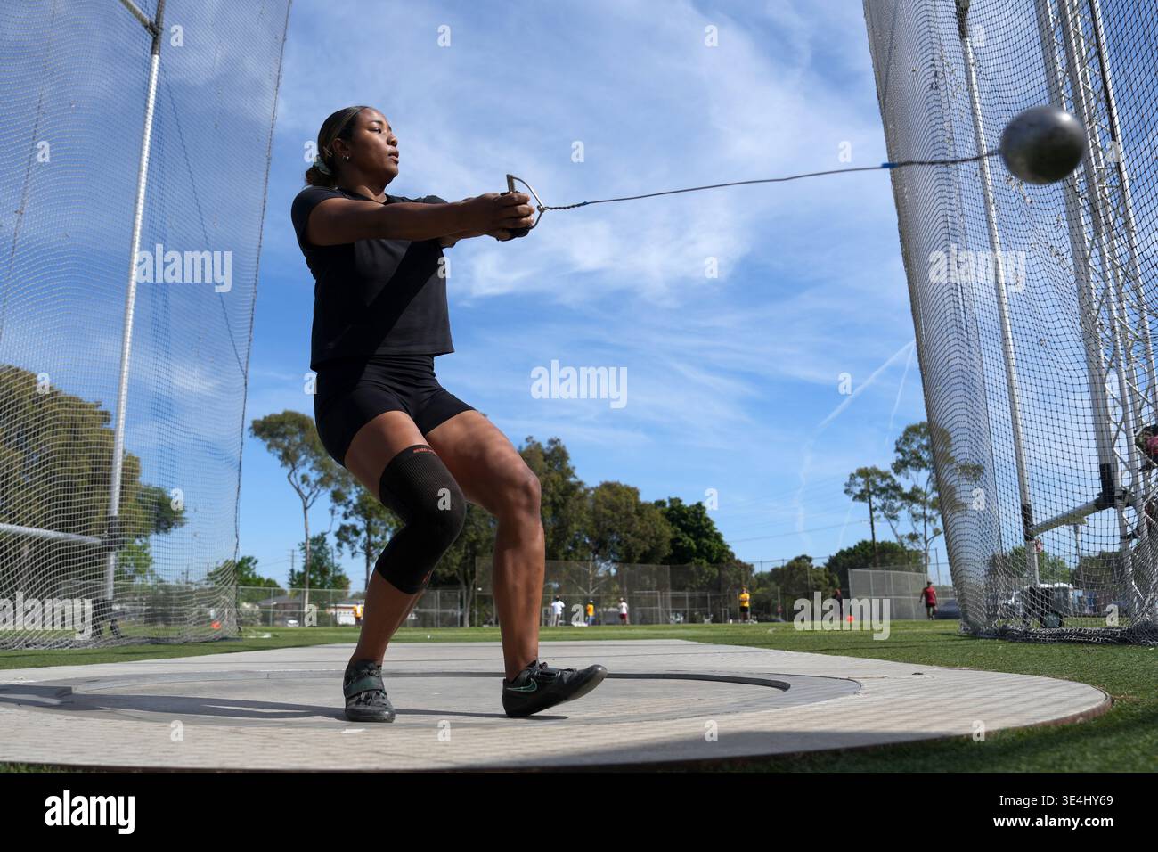 Joy McArthur throws in the women's hammer during the Ron and Sharlene ...
