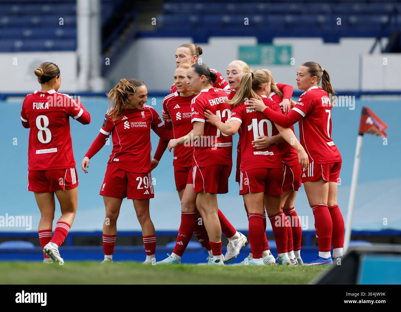 Liverpool's Ceri Holland celebrates with her team mates scoring from ...
