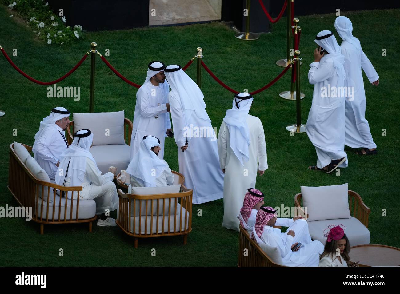 Racegoers gather at the Meydan Racecourse ahead of Dubai World Cup in ...