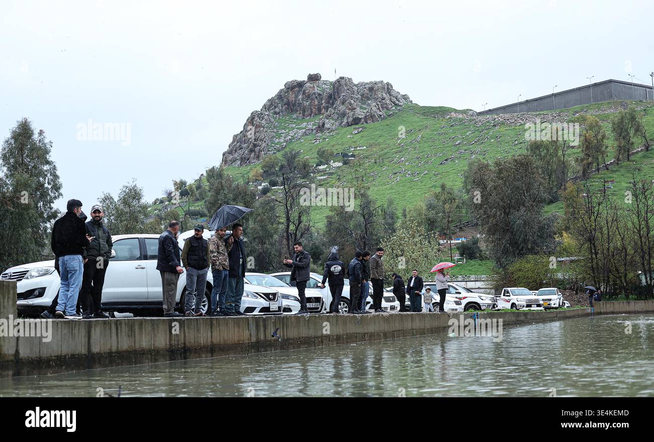 People visit the revived Hasar spring in the city of Sayid Sadiq ...