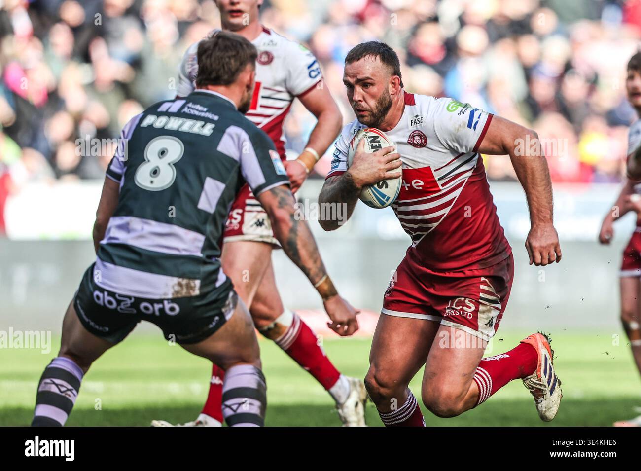 Kaide Ellis of Wigan Warriors breaks with the ball during the Betfred ...