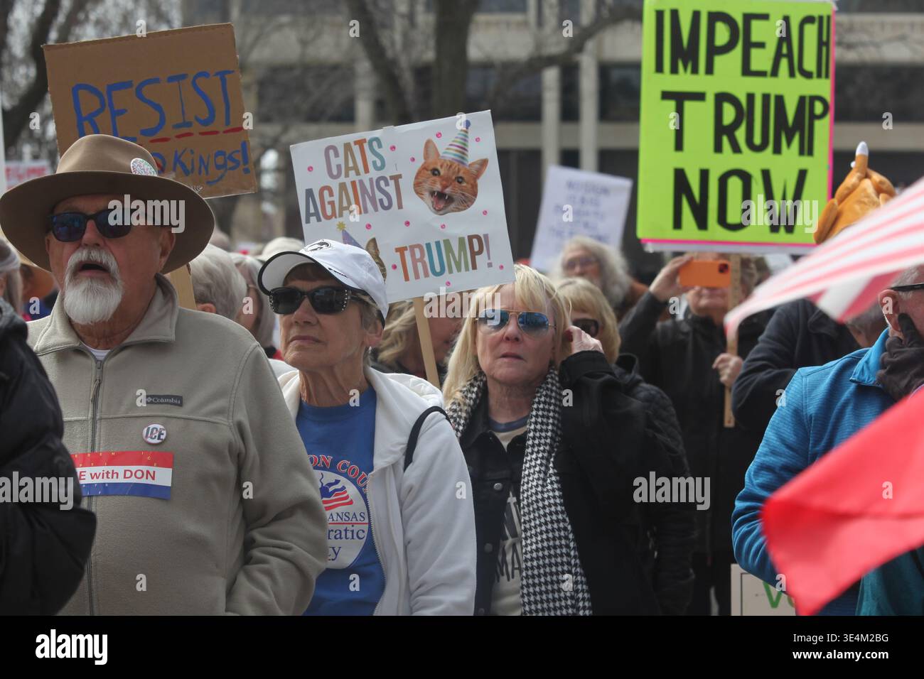 Wendy Wyatt, of Lawrence, Kan., holds her "Cats Against Trump" sign ...