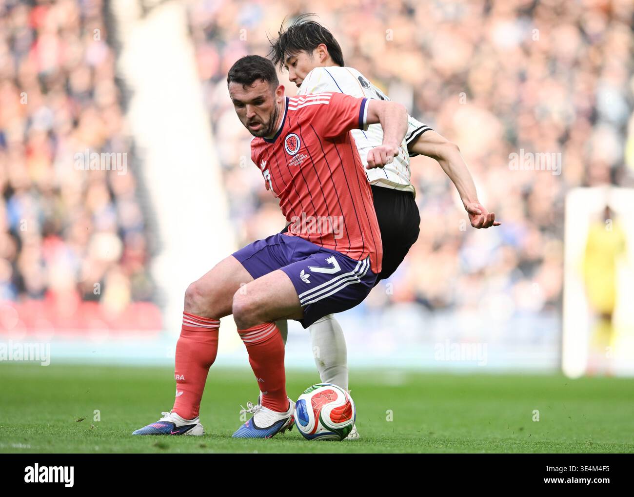 Glasgow, Scotland, 28th March 2026. John McGinn of Scotlandand Hiroki ...
