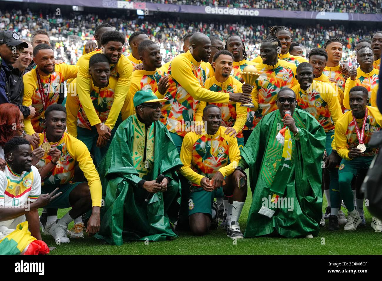 Singer Youssou N'dour, bottom row third left, celebrates with the ...