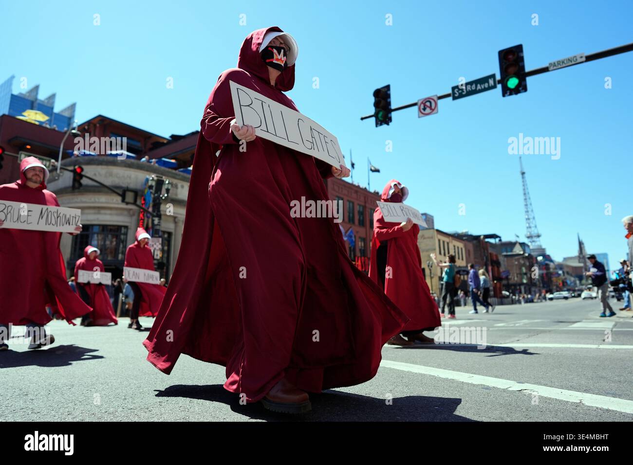 Demonstrators dressed as characters from the TV series, "The Handmaid's ...
