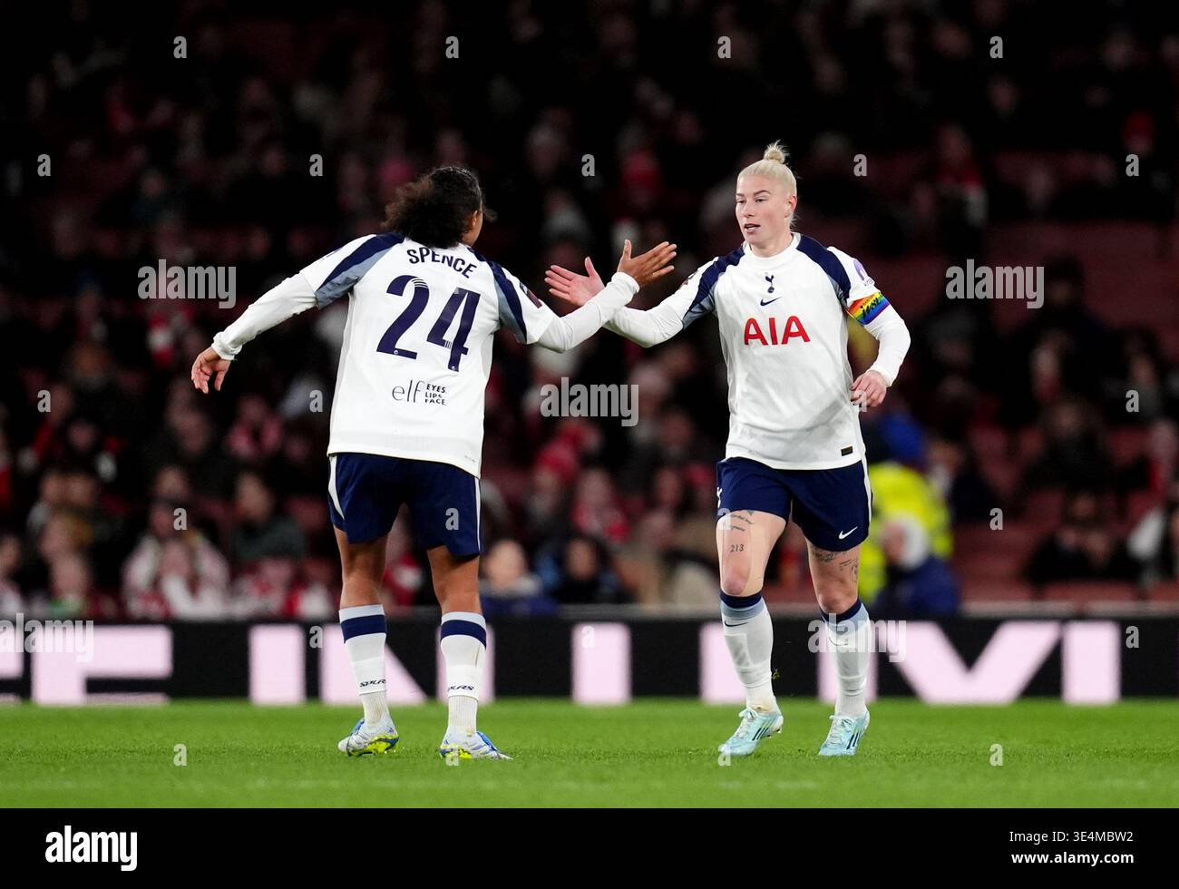 Tottenham Hotspur's Bethany England (right) celebrates with Drew Spence ...