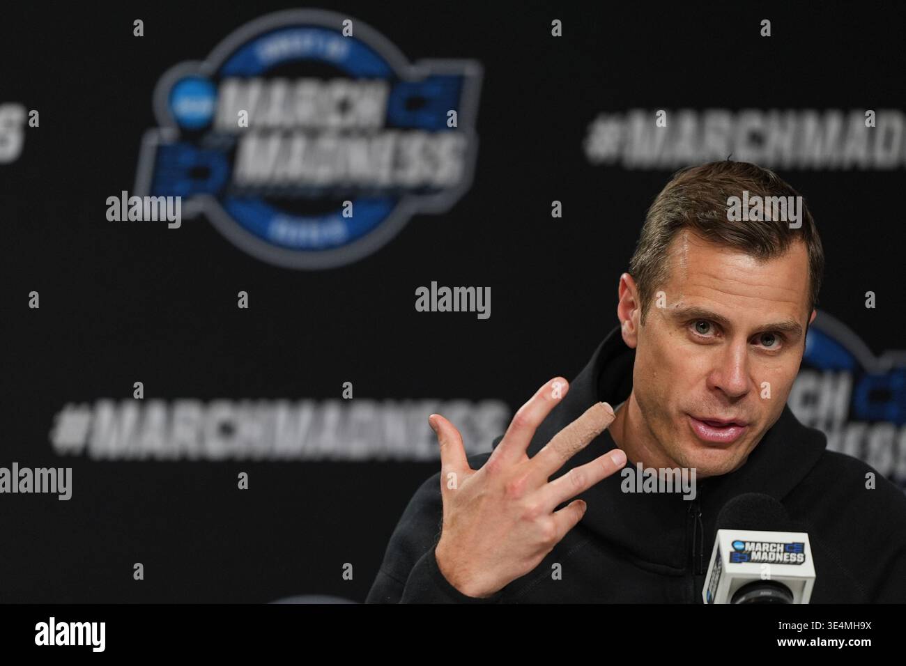 Duke head coach Jon Scheyer speaks during a press conference ahead of a ...