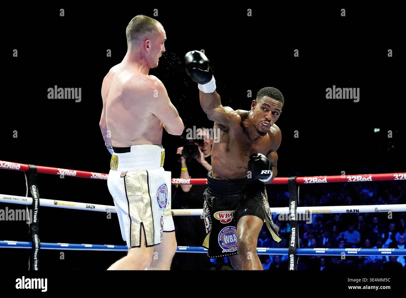 Ezra Taylor (right) attempts to land a punch on Willy Hutchinson during ...