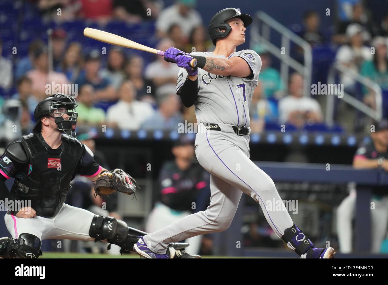 Colorado Rockies' TJ Rumfield (7) watches after hitting a solo home run ...