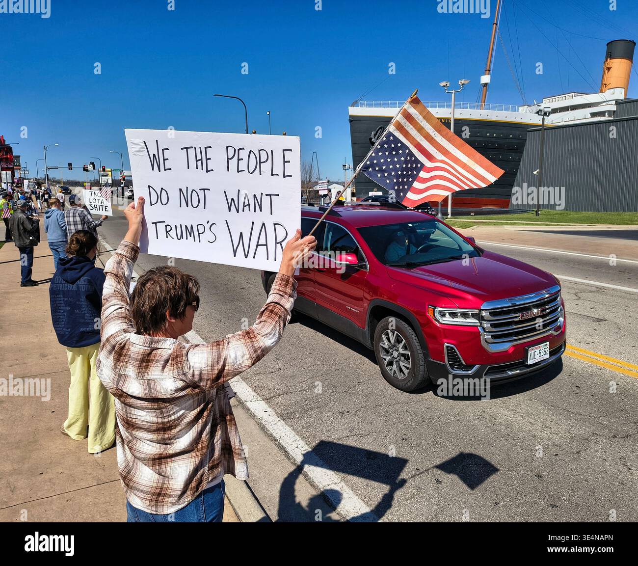 Branson, Missouri, USA. 28 Mar 2026. No Kings 3 protesters picket along ...