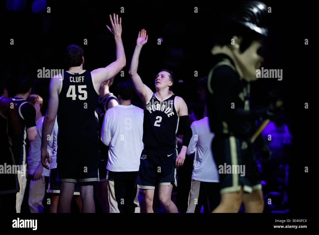 Purdue center Oscar Cluff (45) high-fives guard Fletcher Loyer (2 ...