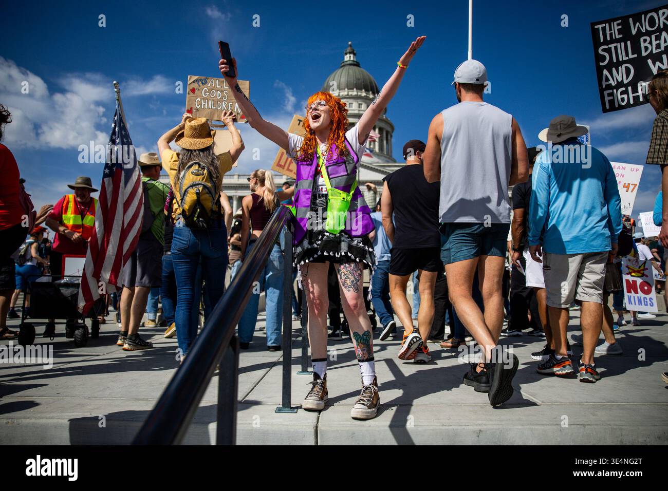 Denise Weaver, an organizer of the event, center, takes part in a "No ...