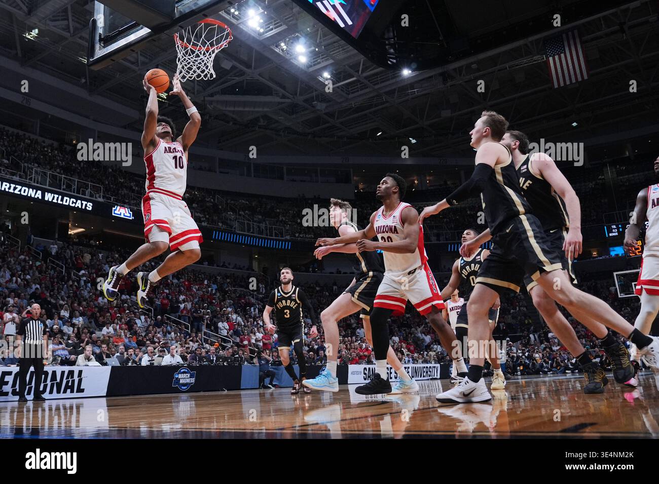 Arizona forward Koa Peat (10) drives to the basket against Purdue ...