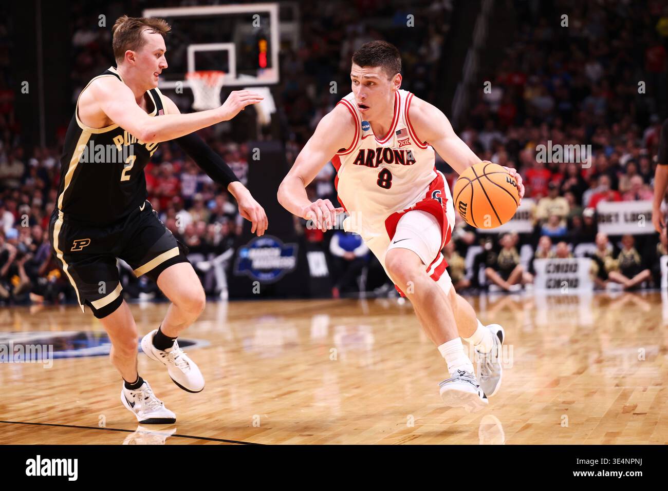 Arizona forward Ivan Kharchenkov (8) is defended by Purdue guard ...