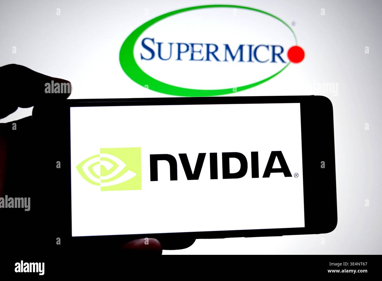 In this photo illustration, a nvidia logo is seen displayed on a ...