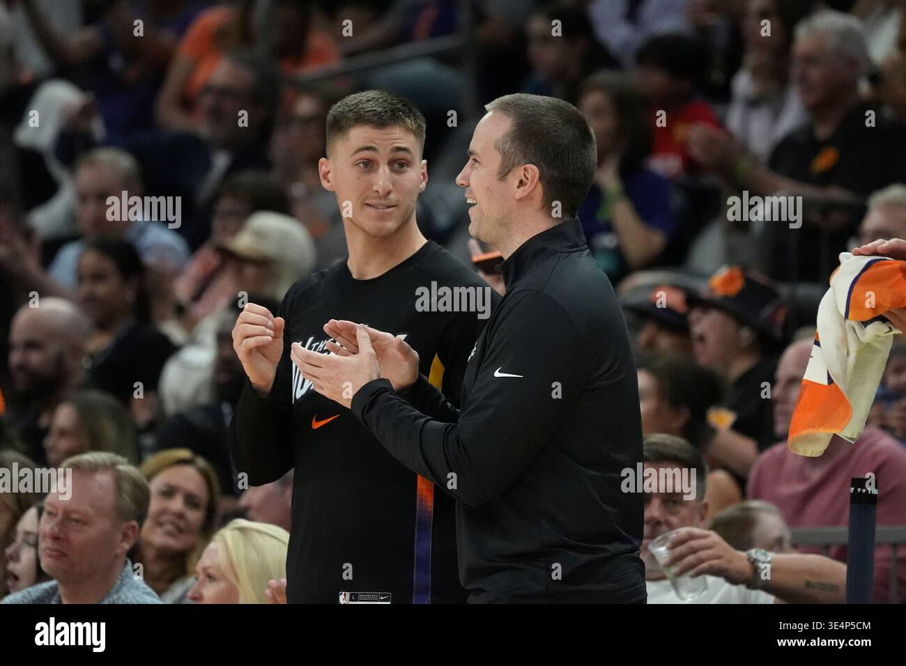 Phoenix Suns head coach Jordan Ott, right, and Suns guard Collin ...