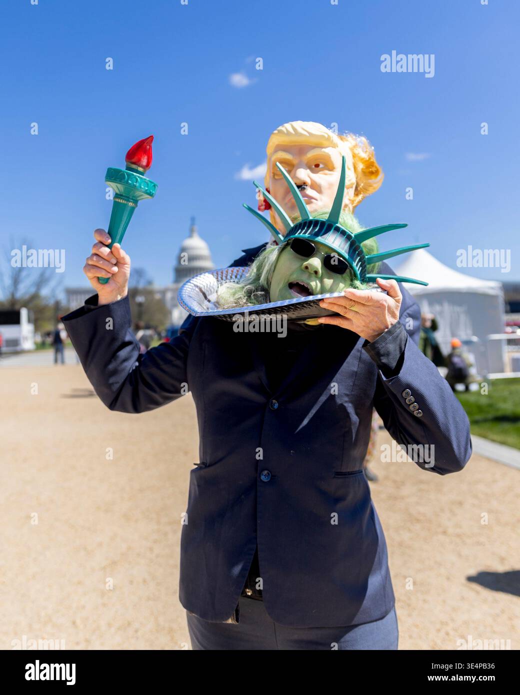 A Demonstrator dressed as Lady Liberty as she participates in the "No ...