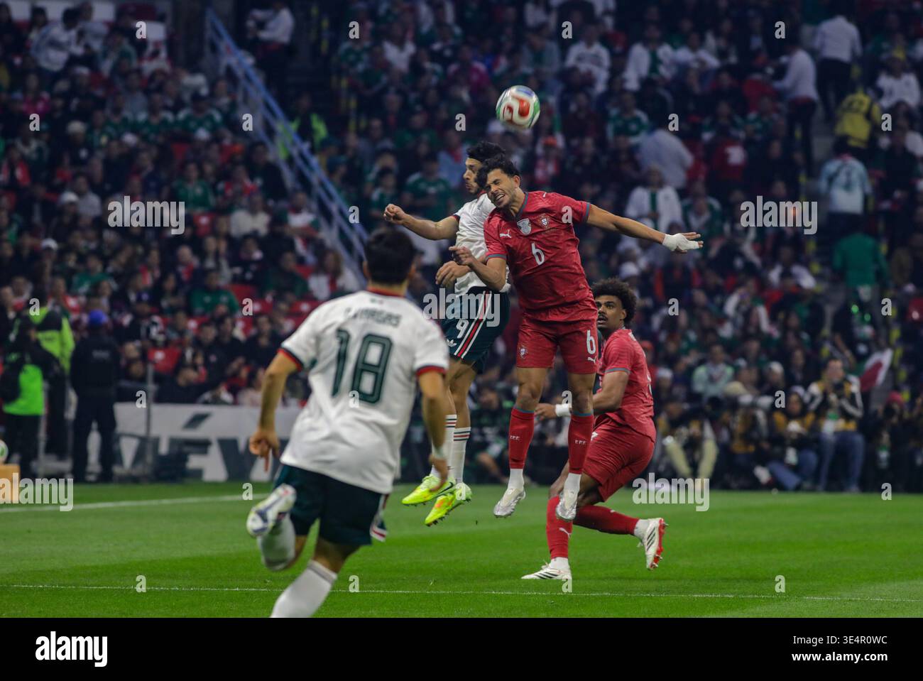 Matheus Nunes #6 of Portugal and Raúl Jiménezbattle for the header ...