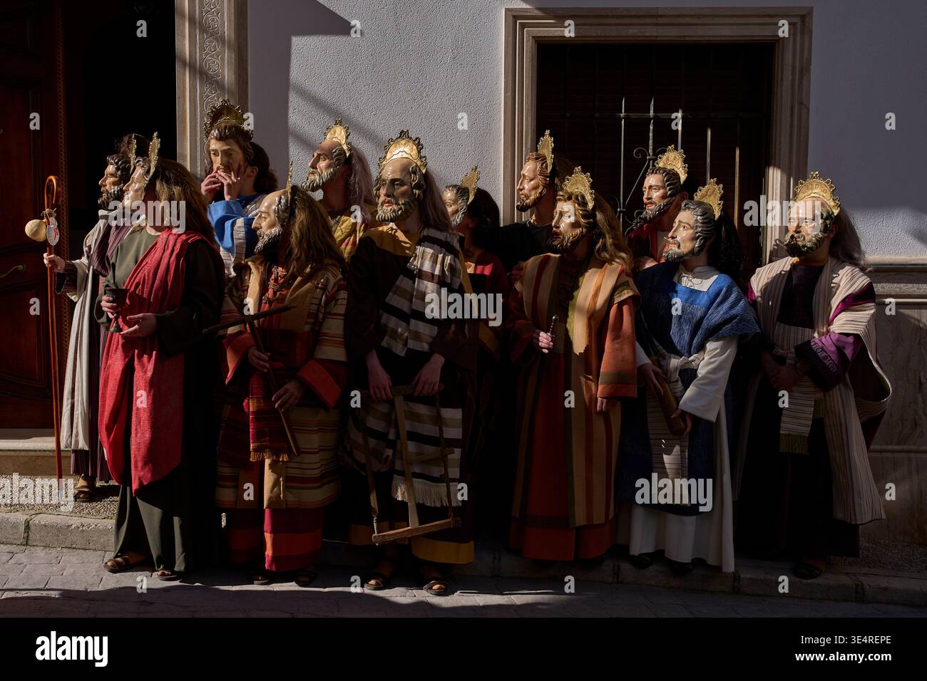 Penitents of the 'Pollinita' brotherhood, dressed in typical Apostle ...