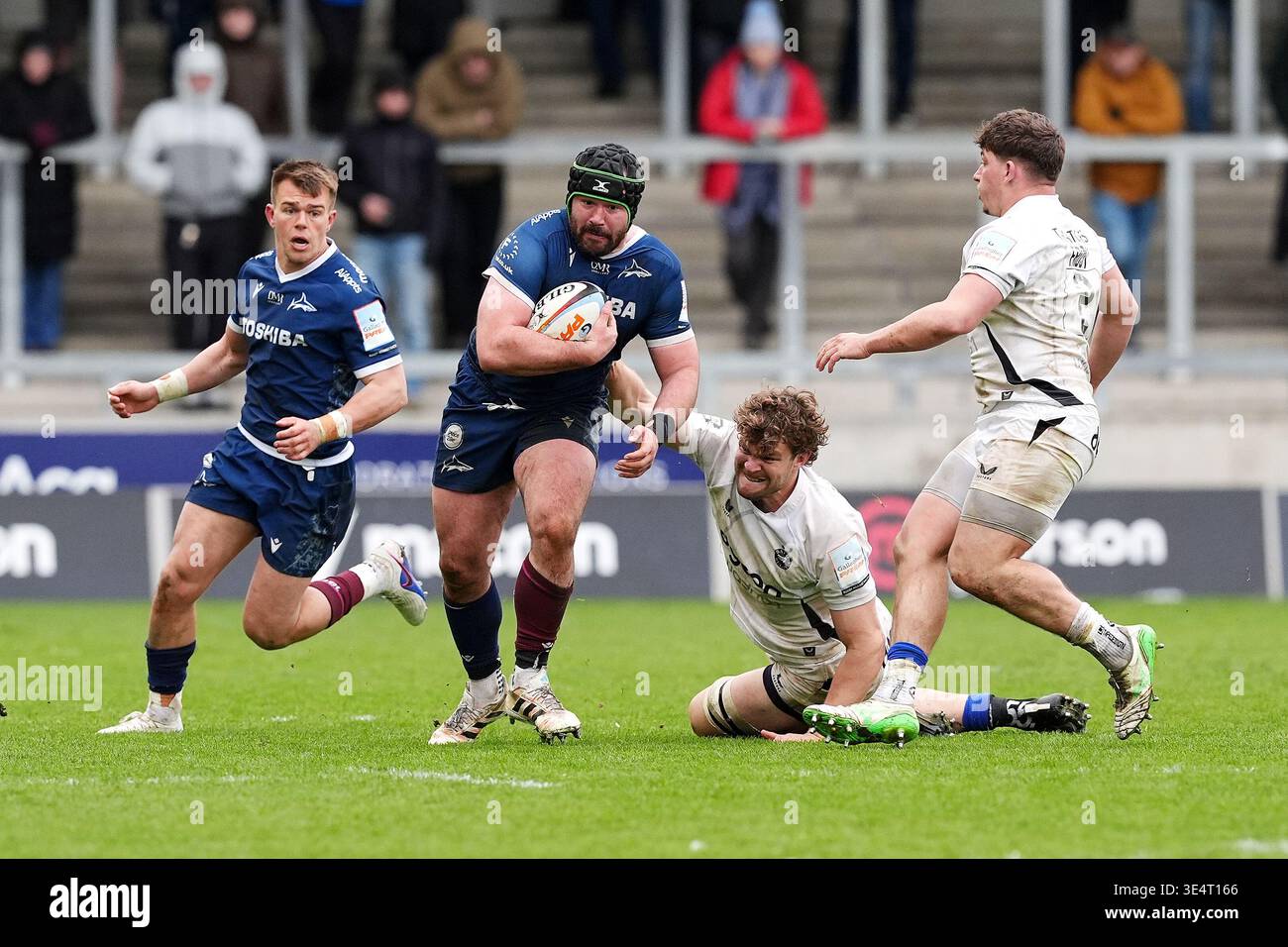 Sale Sharks' Bevan Rodd (centre left) is tackled by Bath Rugby's Ethan ...