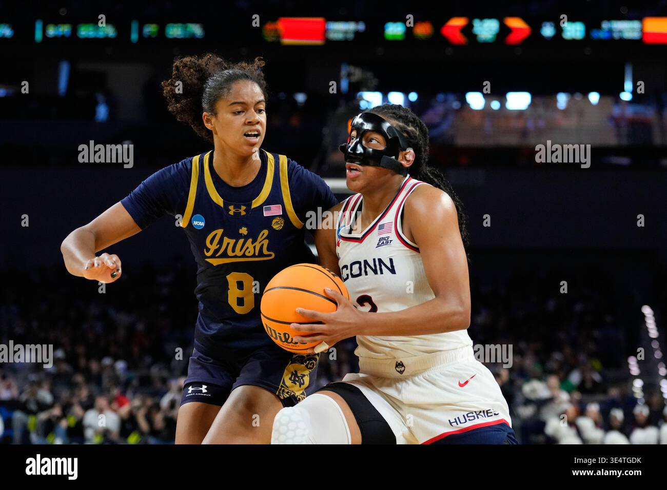 UConn guard KK Arnold, right, drives against Notre Dame guard Cassandre ...