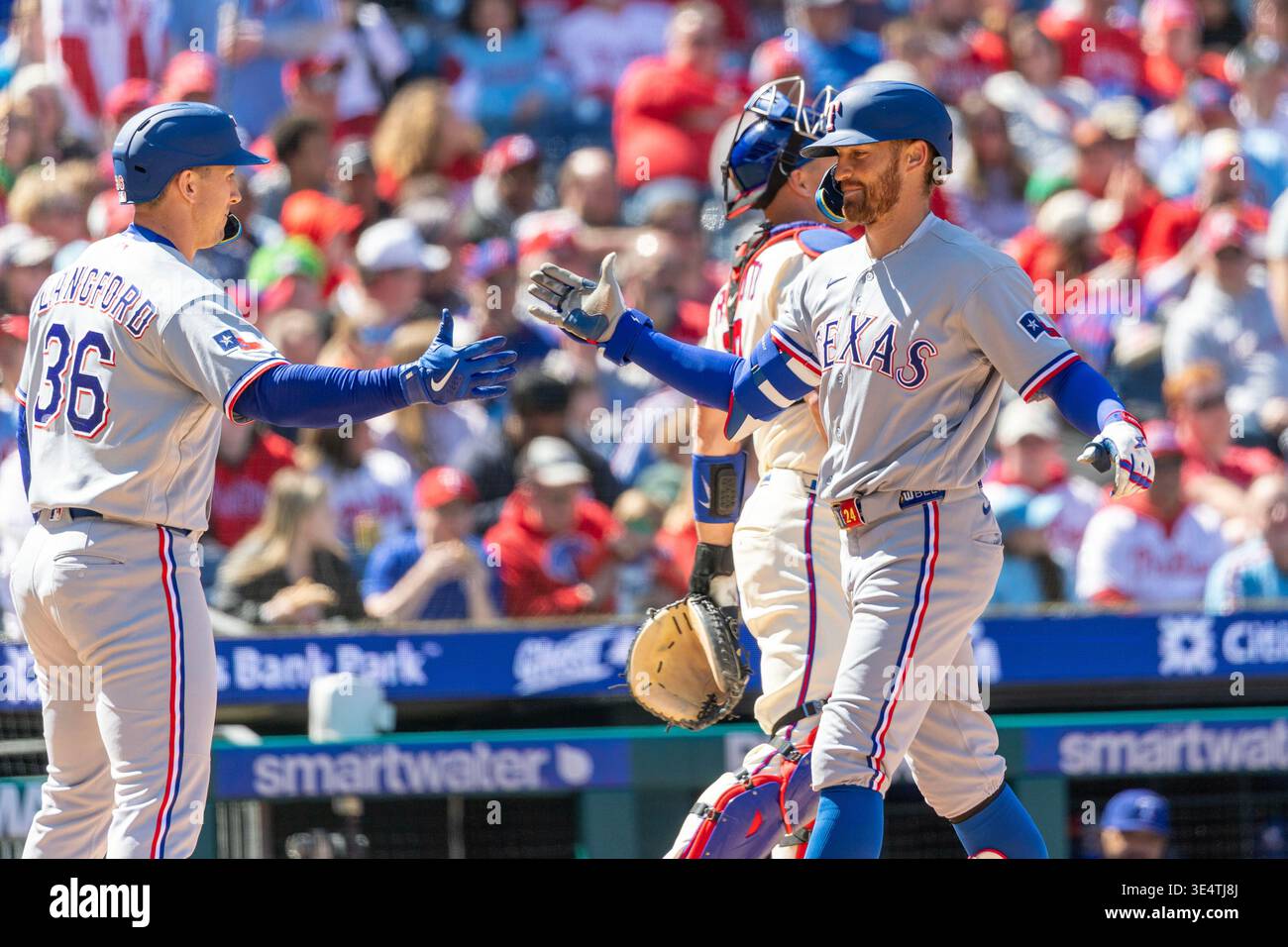 Texas Rangers' Brandon Nimmo, right, celebrates his two run homer with ...