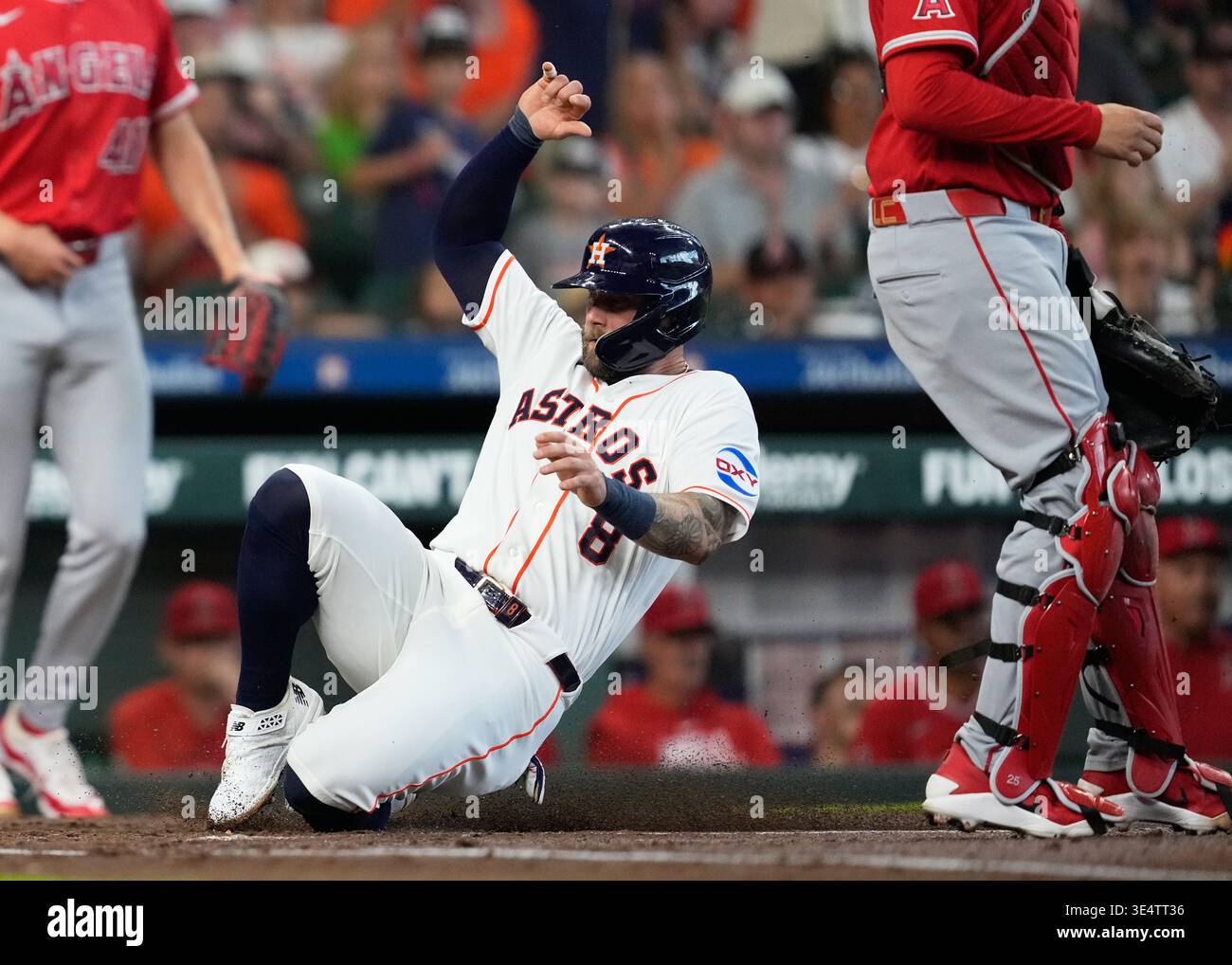 Houston Astros' Christian Walker scores during the second inning of a ...