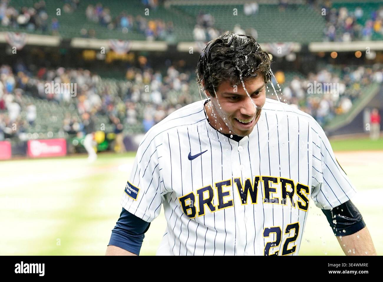 Water drips from Milwaukee Brewers's Christian Yelich after being ...