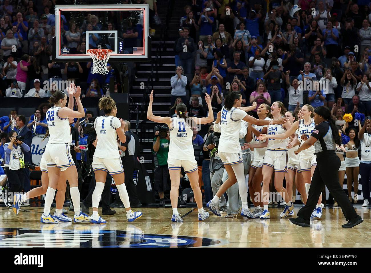 UCLA celebrate at the end of the Elite Eight of the NCAA college ...
