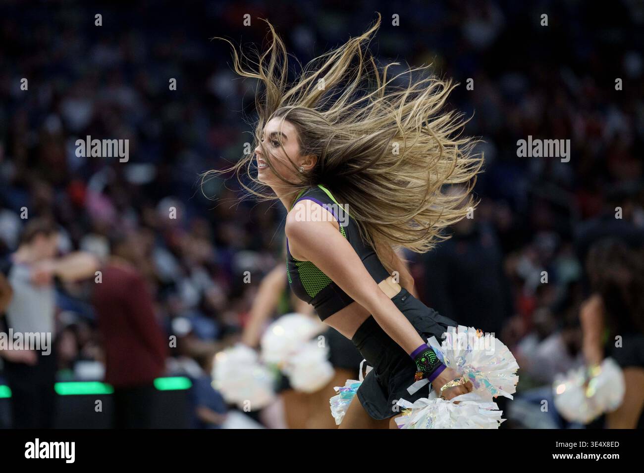 A member of the New Orleans Pelicans PelSquad performs during an NBA ...