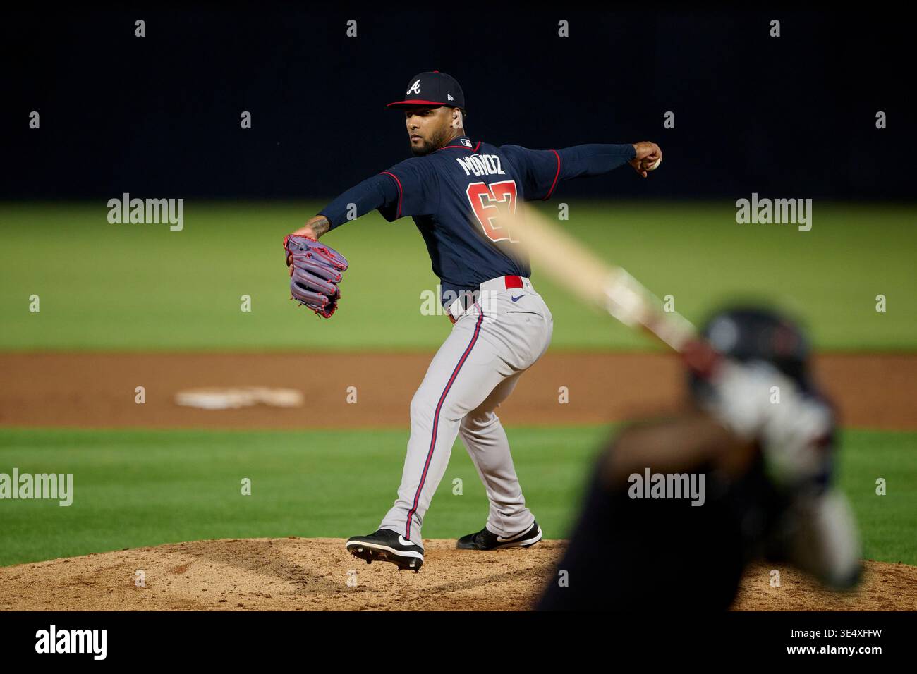 Atlanta Braves pitcher Rolddy Muñoz (67) delivers a pitch during an MLB ...