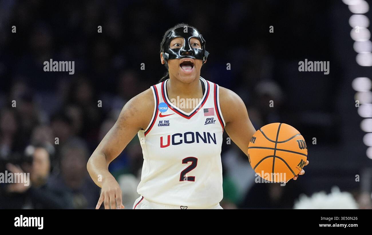UConn guard KK Arnold dribbles up court against Notre Dame during the ...