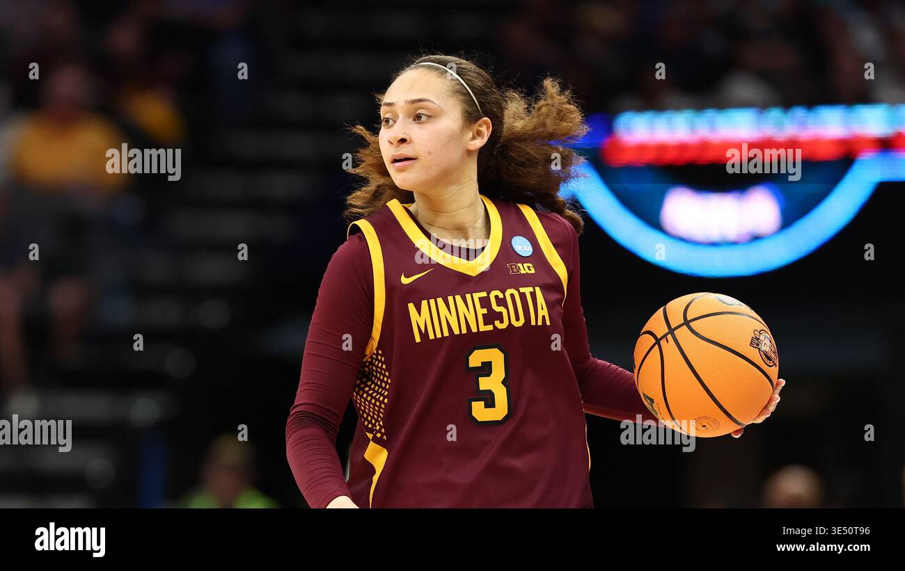 Minnesota guard Amaya Battle dribbles upcourt during the first half in ...