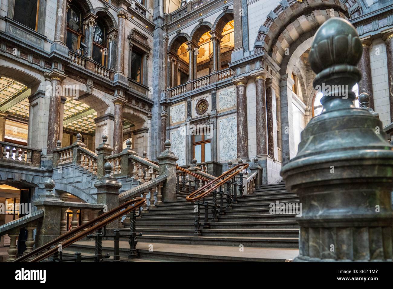 Side view of the grand stone staircase at Antwerp Central Station. The ...