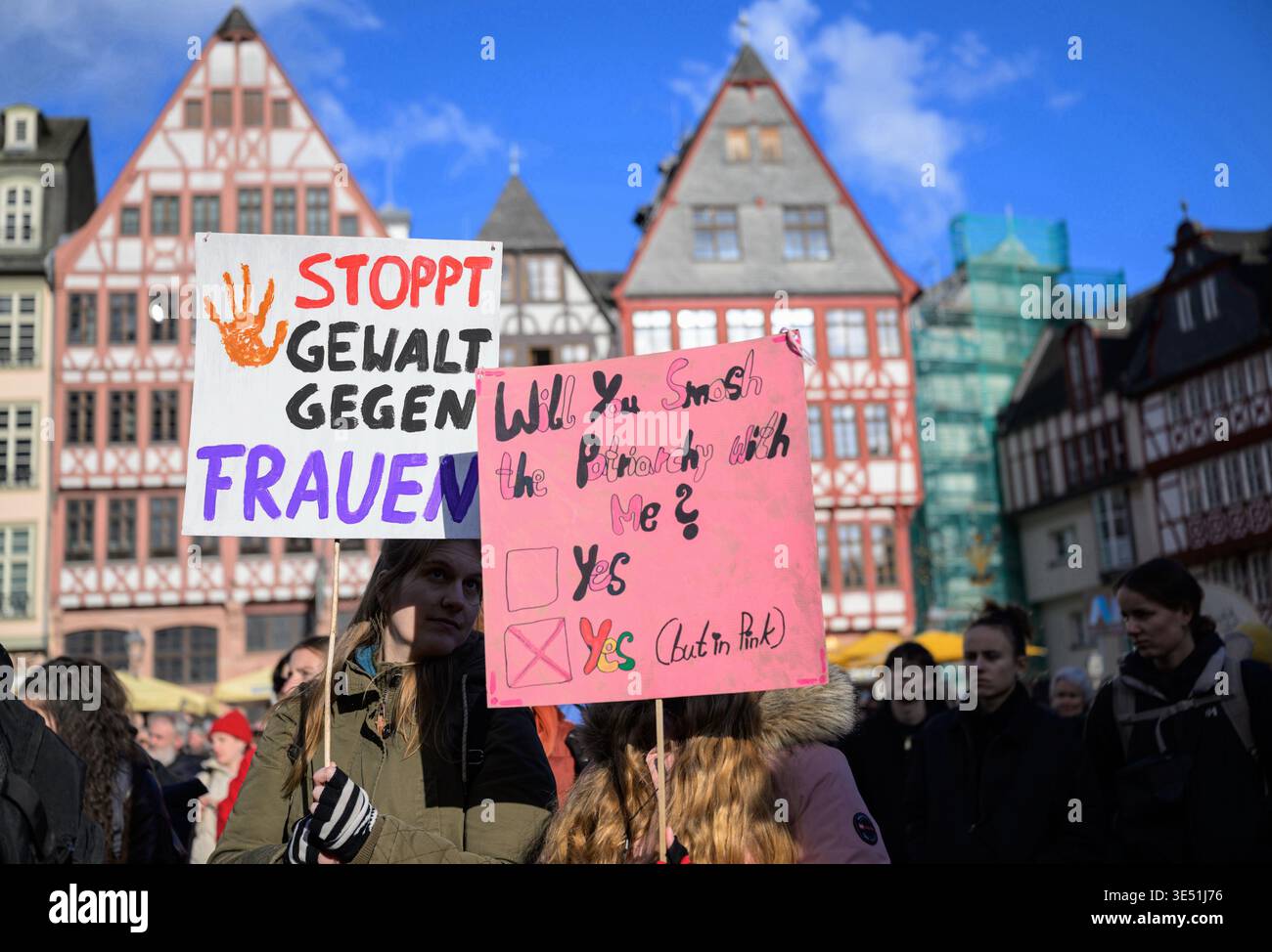 30 March 2026, Hesse, Frankfurt/Main: A participant carries a sign ...
