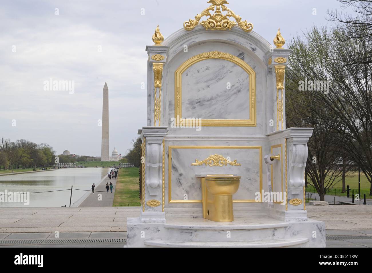 A large golden toilet named ''A Throne Fit for a King'' is seen near ...