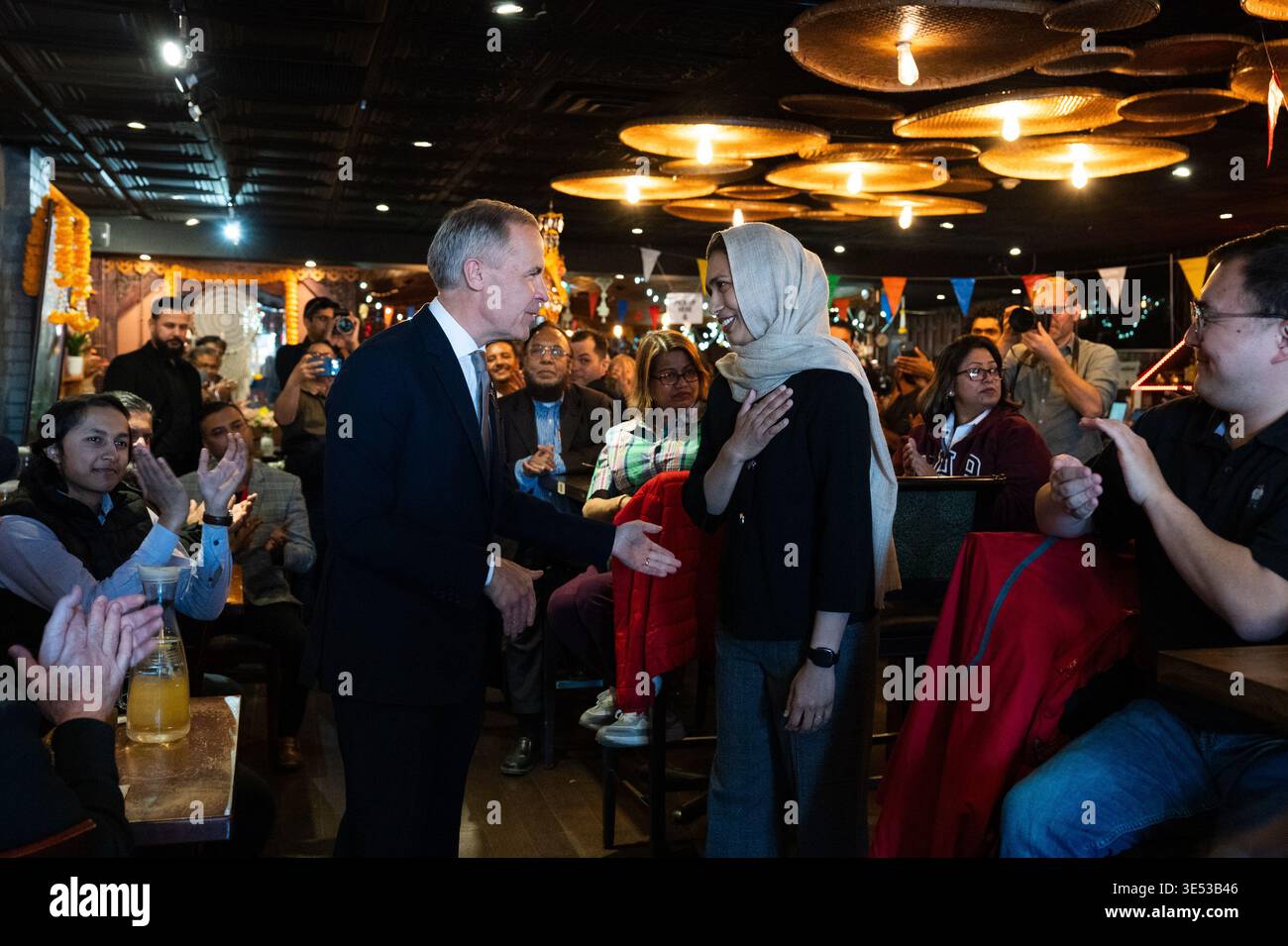 Prime Minister Mark Carney and Liberal MP candidate Doly Begum visit ...