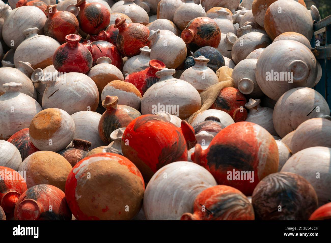 Clay Coin Banks are Piled for Sale at a fair in Bangladesh. People buy ...