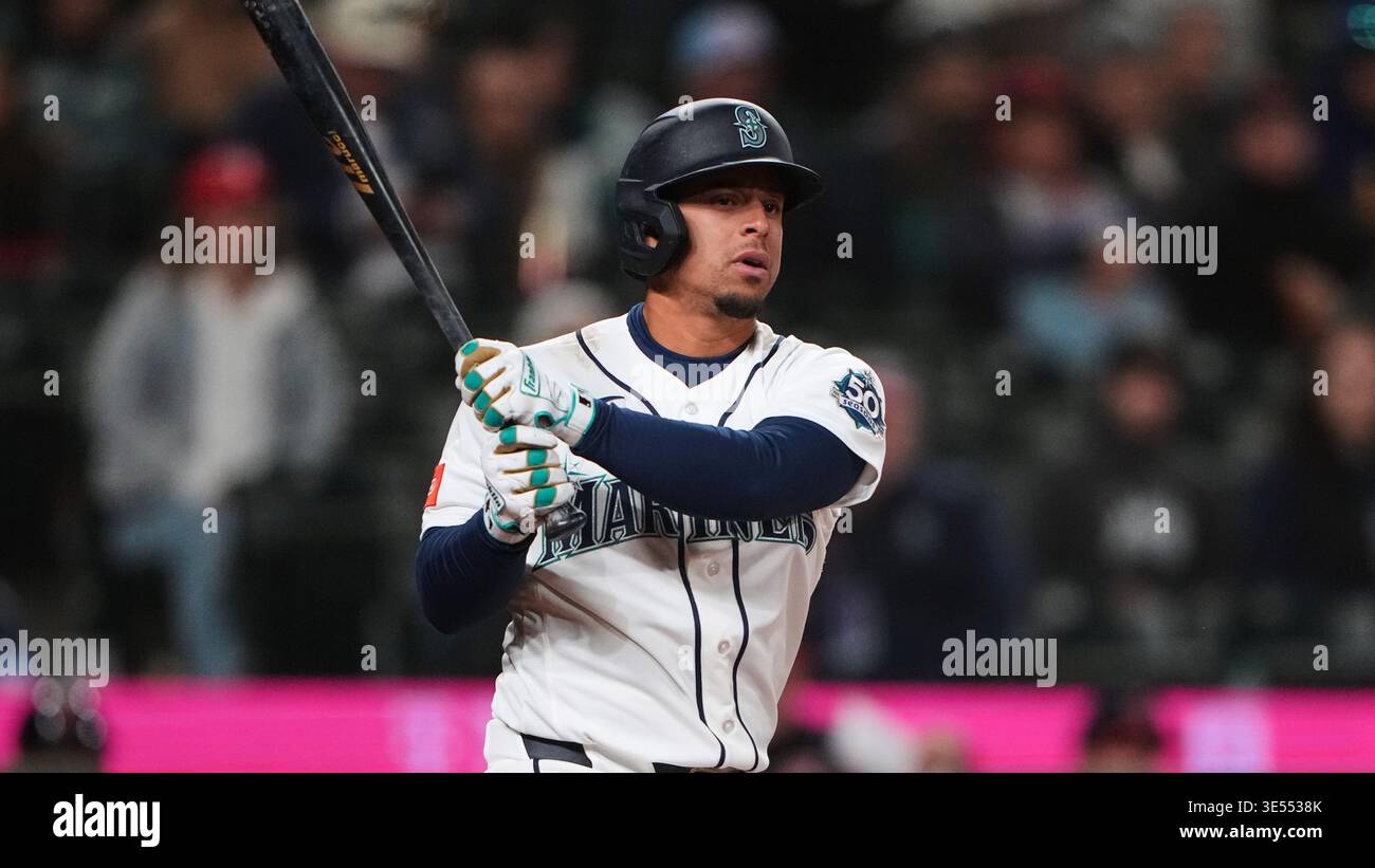 Seattle Mariners' Leo Rivas follows through during a baseball game ...